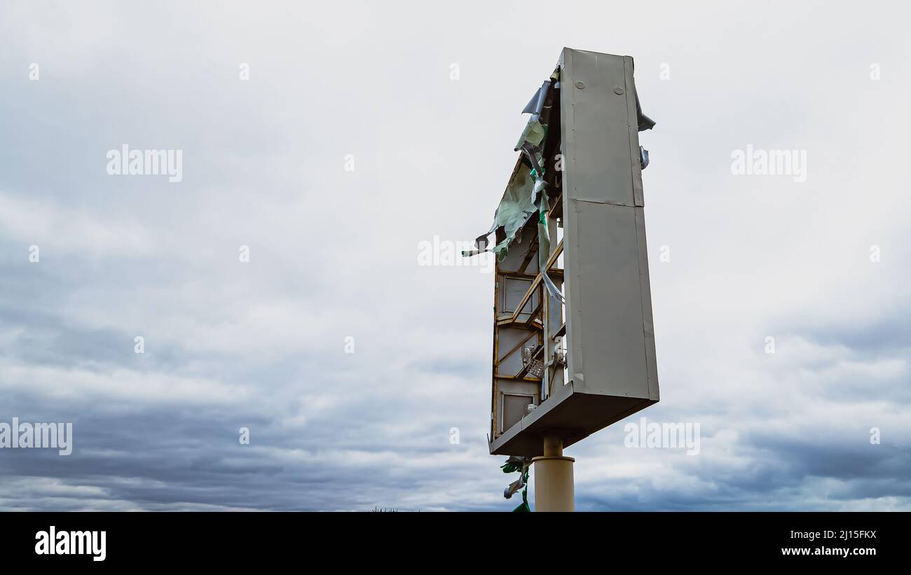 Strong winds destroyed the sign Stock Photo - Alamy