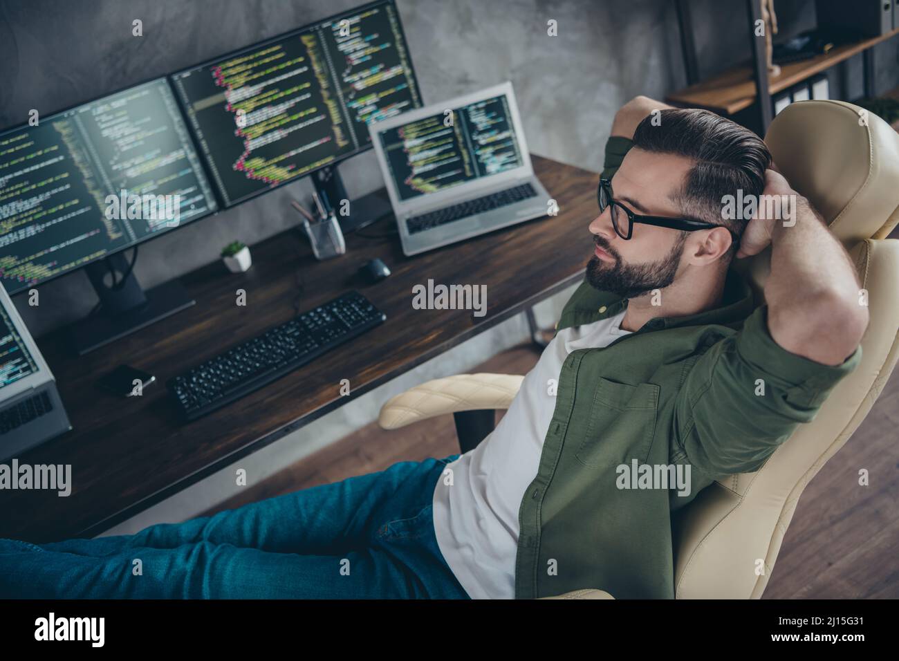 Photo of tired dreamy young man wear green shirt spectacles having rest ...