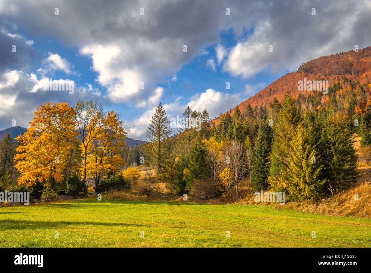 Autumn rural landscape in a mountain valley. The Vratna valley in Mala ...