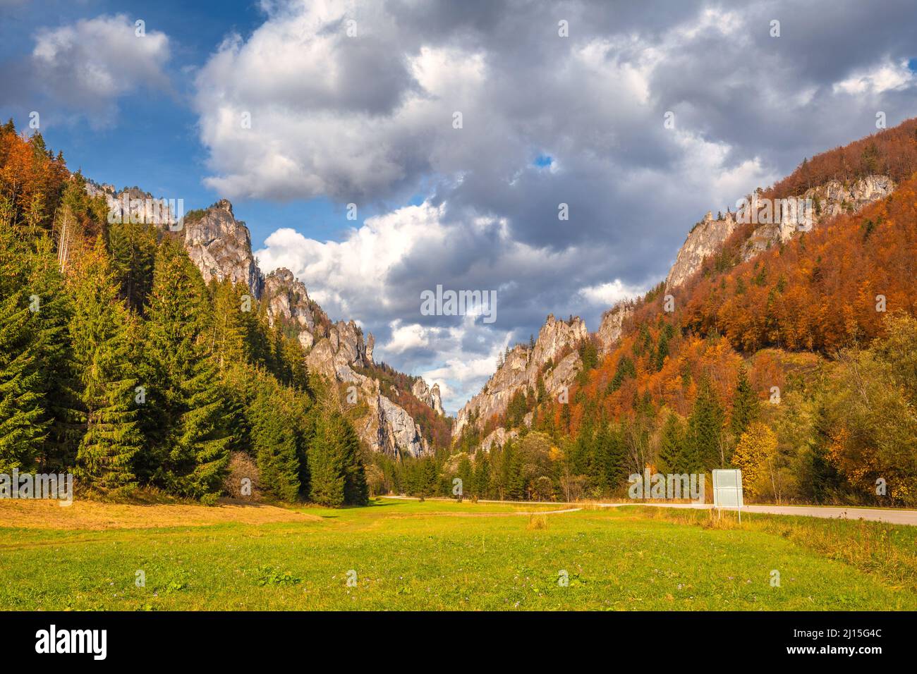 Road through a rocky gorge in a mountain valley at autumn. The Vratna ...