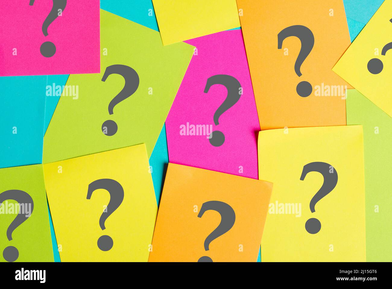 Question marks on colorful paper, looking for an answer, searching for ...
