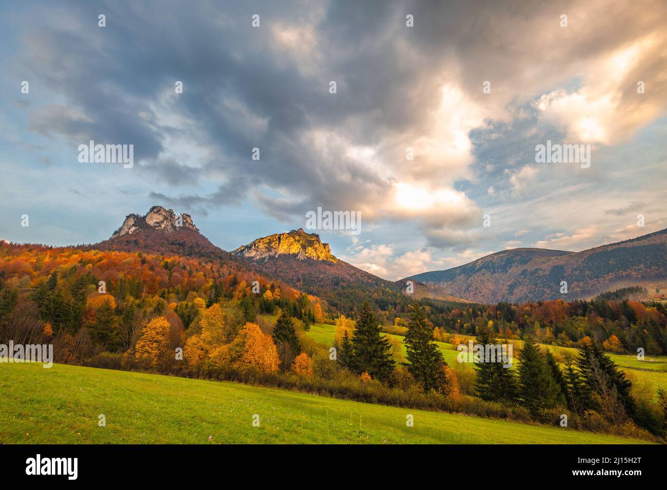 Autumn rural landscape with mountains peaks on background. The Vratna ...