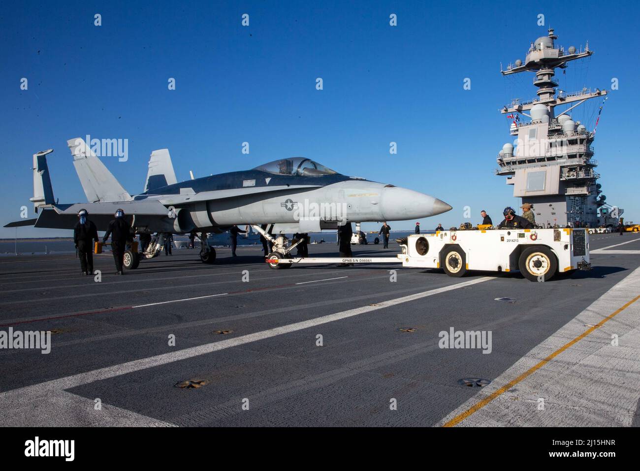 Sailors assigned to USS Gerald R. Ford’s (CVN 78) air department, tows ...