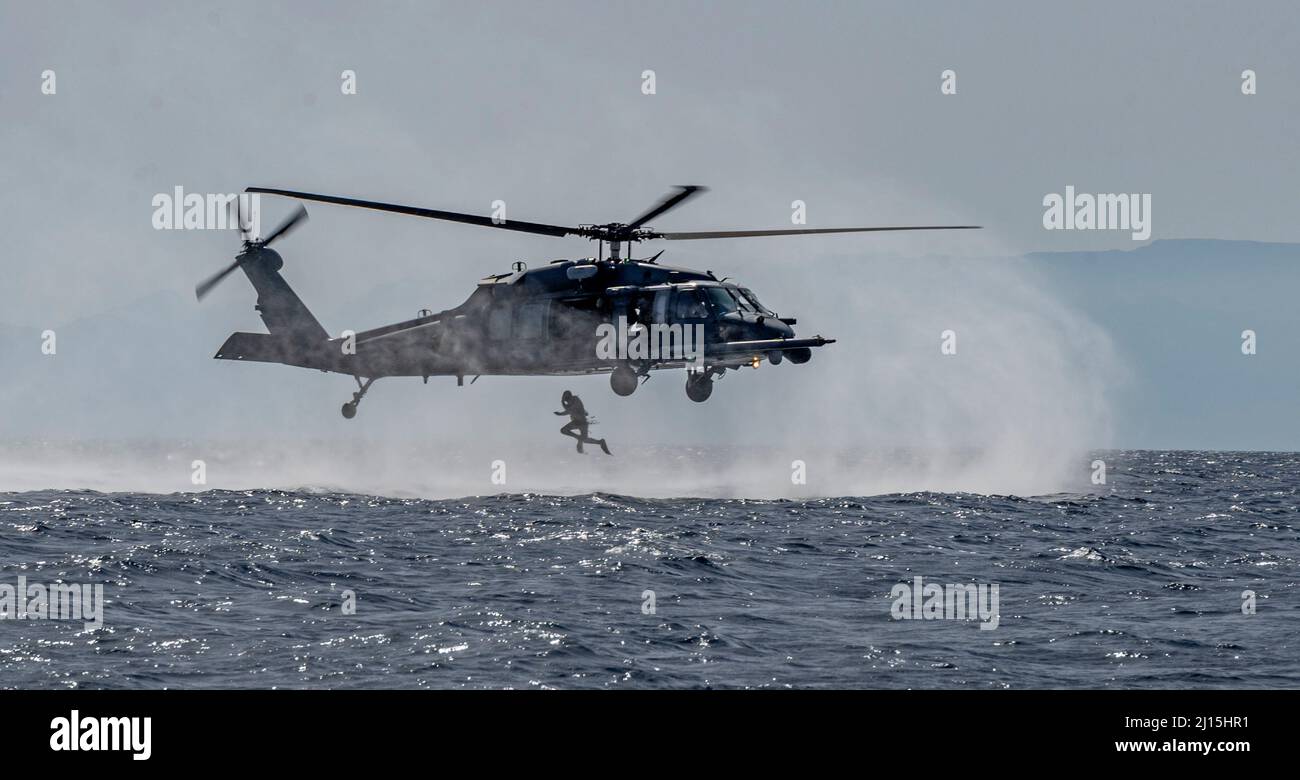 A Royal Jordanian Navy Frogman jumps from an HH-60G Pave Hawk ...