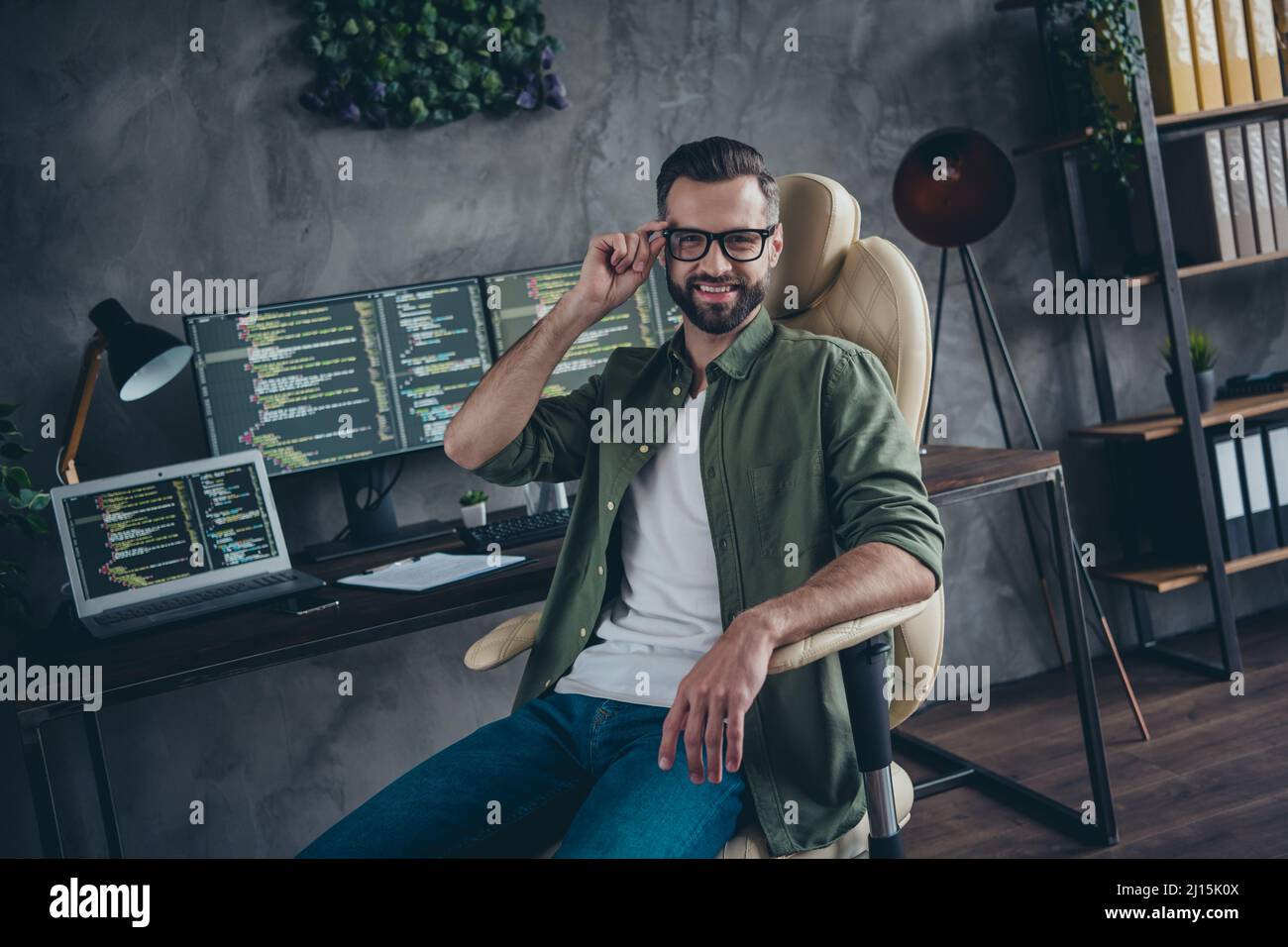 Photo of skilled nerd guy touch specs remote distance work java script ...