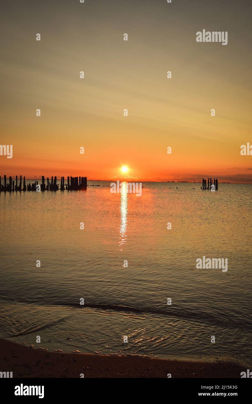 Beautiful sunset over the sea. Beautiful evening sun reflecting on the ...