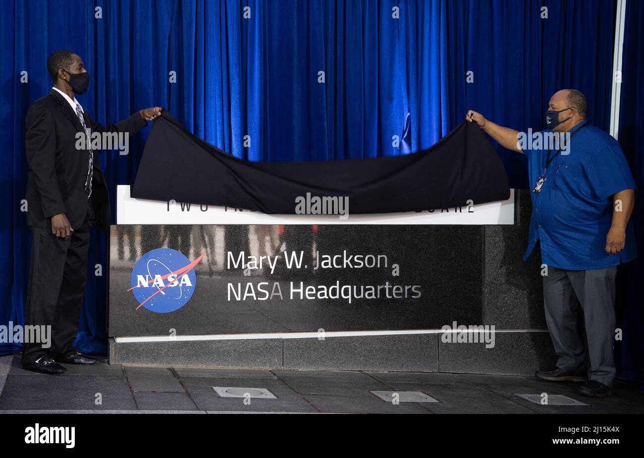 Bryan Jackson, grandson of Mary W. Jackson, left, and Raymond Lewis ...