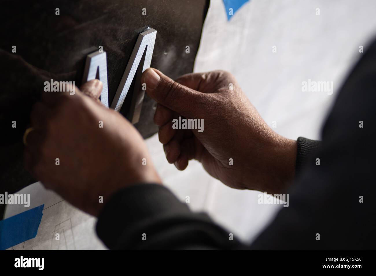 The Mary W. Jackson NASA Headquarters sign is installed ahead of the ...
