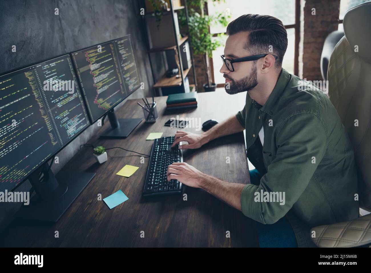 Profile side view portrait of attractive focused intellectual guy nerd ...