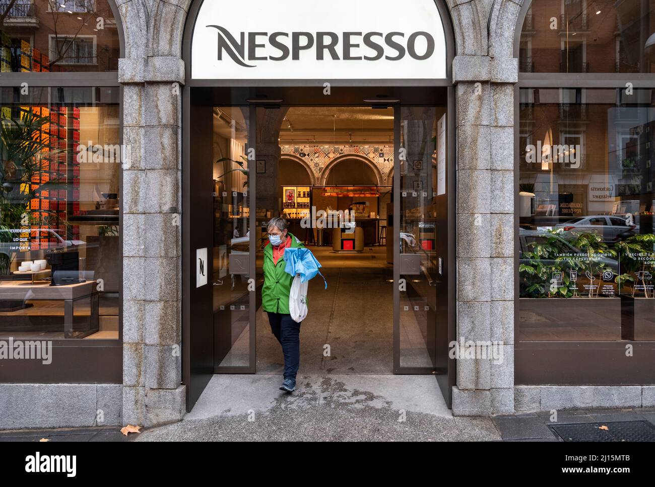 A shopper is seen leaving the Swiss high-end and world leader in coffee ...