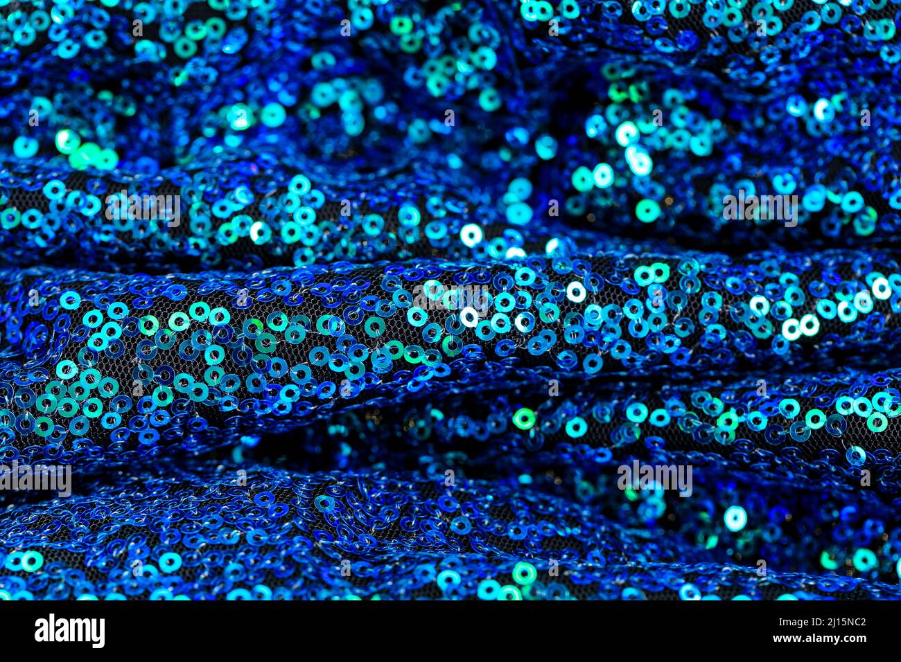 Sequins texture.Green blue sequins background.Shiny blue and green ...