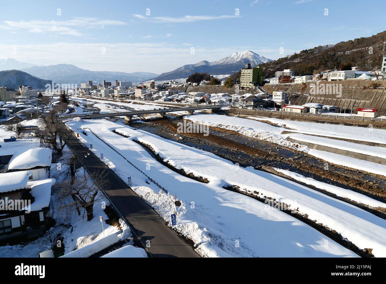 Yudanaka, Nagano, Japan, 2022/22/01 , View of Yomase river and the city ...