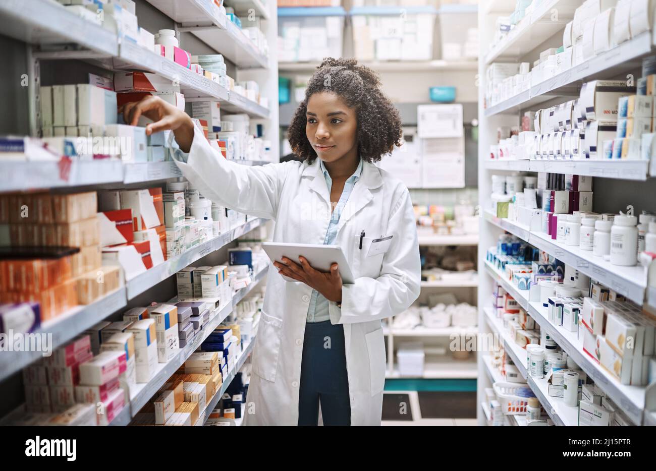 Never fear, your pharmacist is here. Cropped shot of an attractive ...