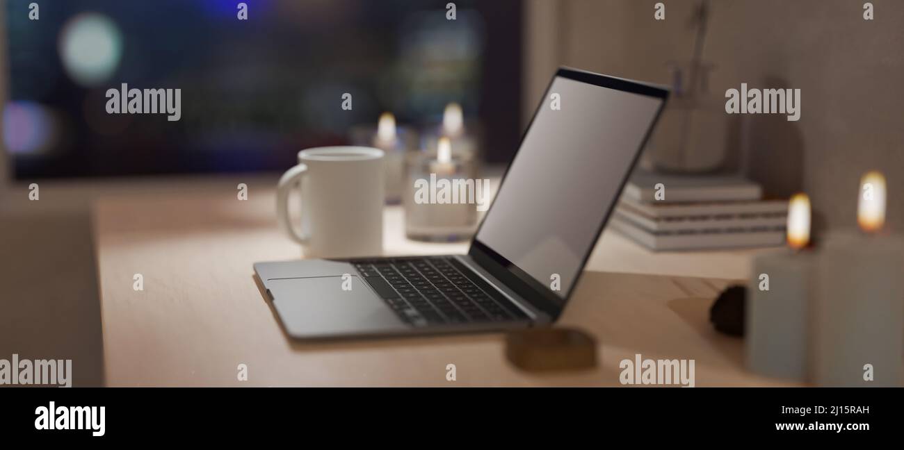 Rear view, Modern home workspace with open portable notebook laptop ...