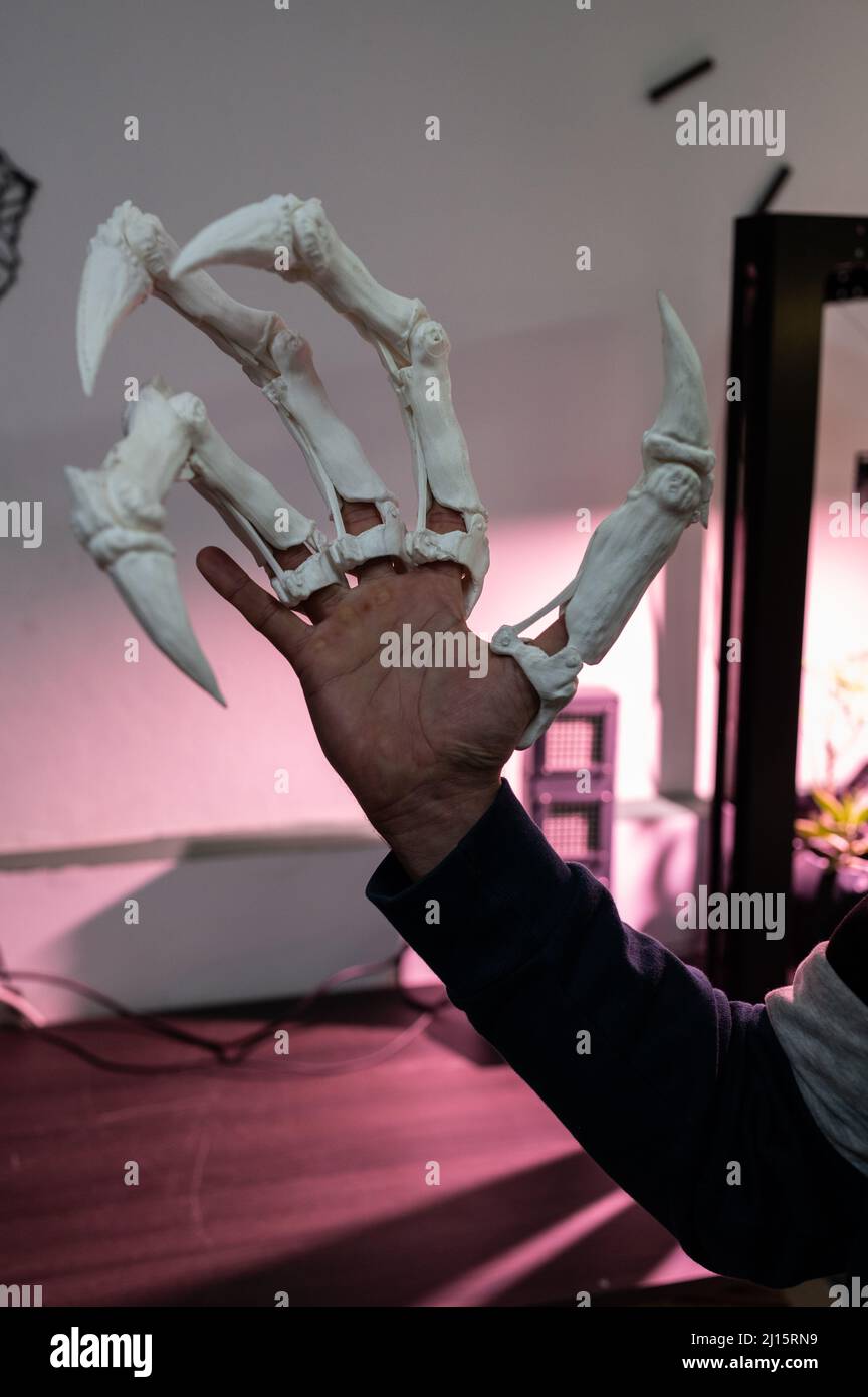 Articulated 3D Printed fantasy fingers Stock Photo - Alamy