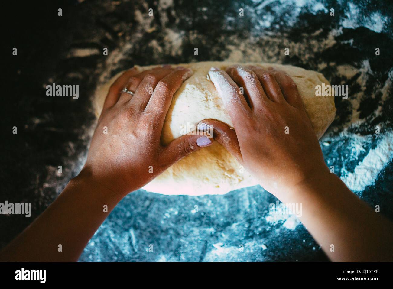 Female hands kneading dough pizza hi-res stock photography and images ...