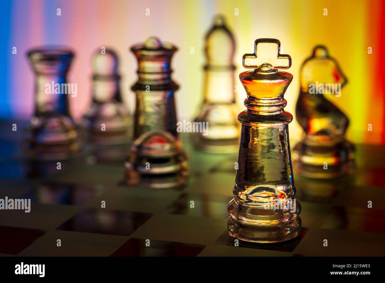 glass chess board game color background Stock Photo - Alamy