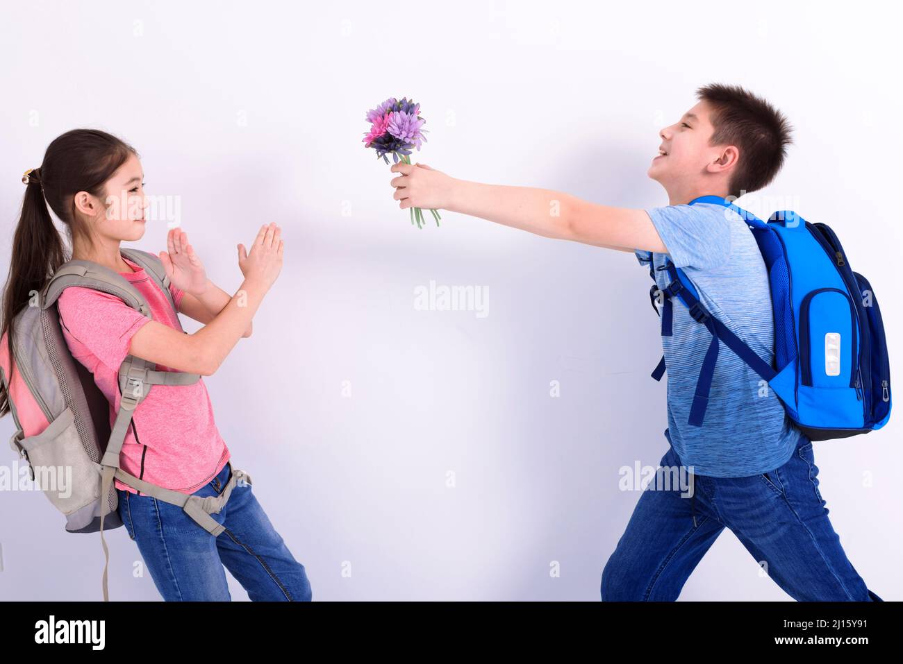 Boy giving flower girl hi-res stock photography and images - Alamy