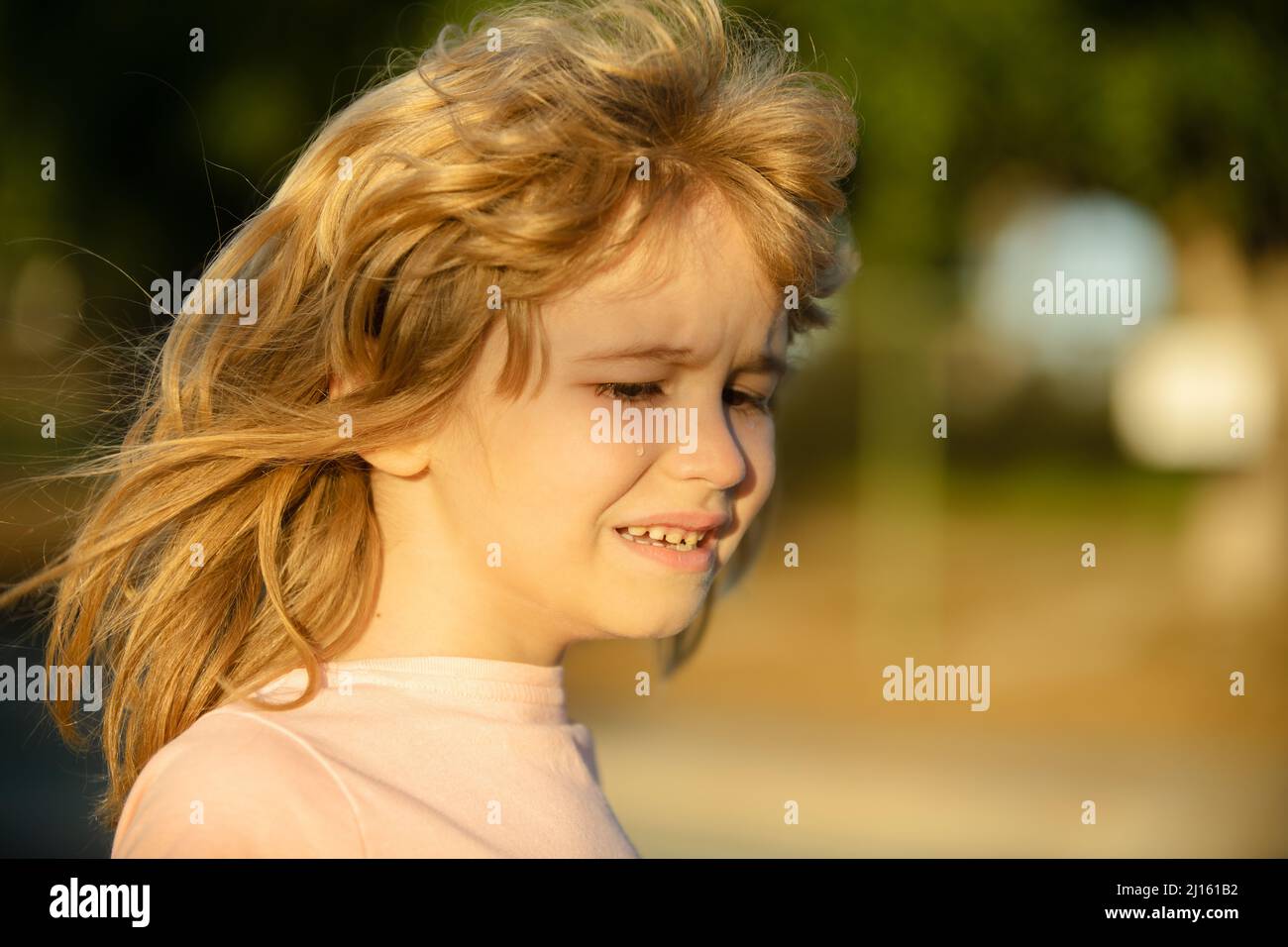 Unhappy sad kid face. Closeup face of child boy crying outdoor. Tears ...