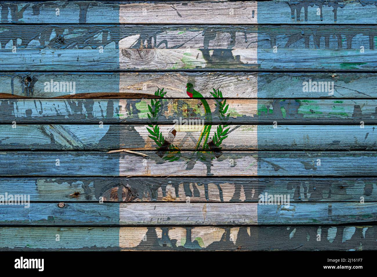 The national flag of Guatemala is painted on uneven boards. Country ...