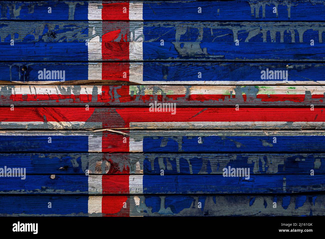 The national flag of Iceland is painted on uneven boards. Country ...