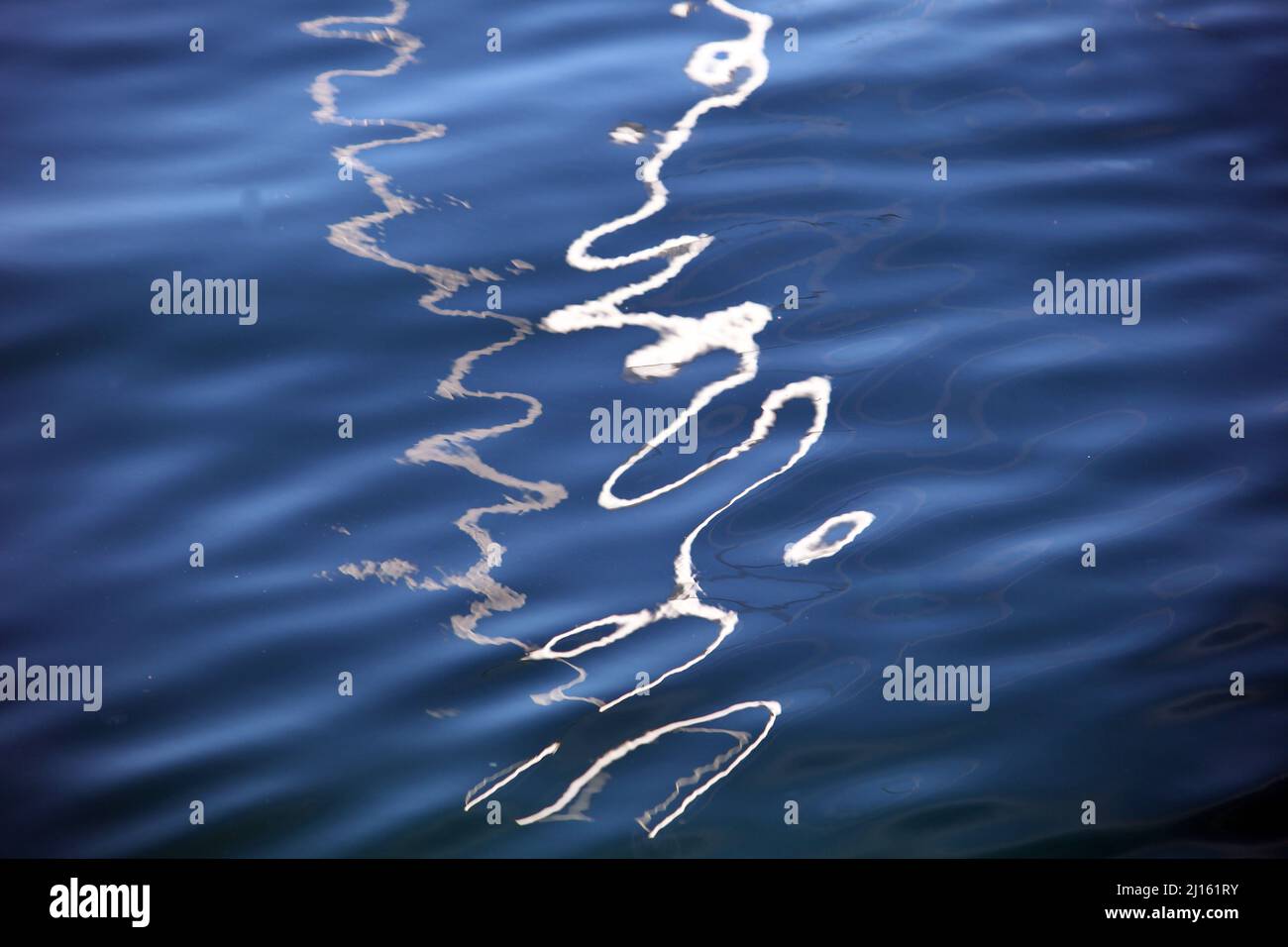 Reflection on water surface Stock Photo - Alamy