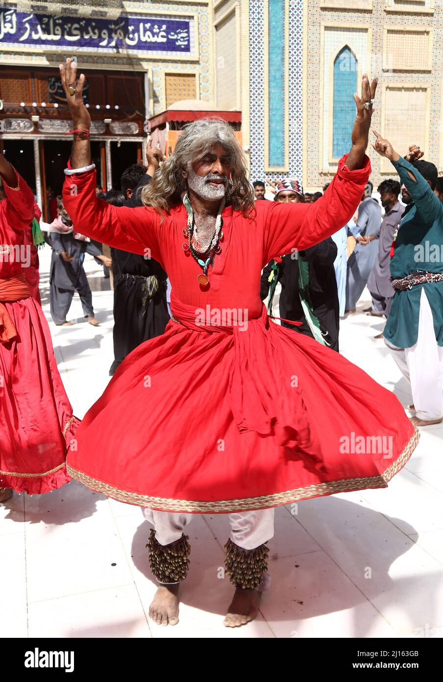March 22, 2022, Sehwan, Sindh, Pakistan: Devotees perform Dhamal during ...