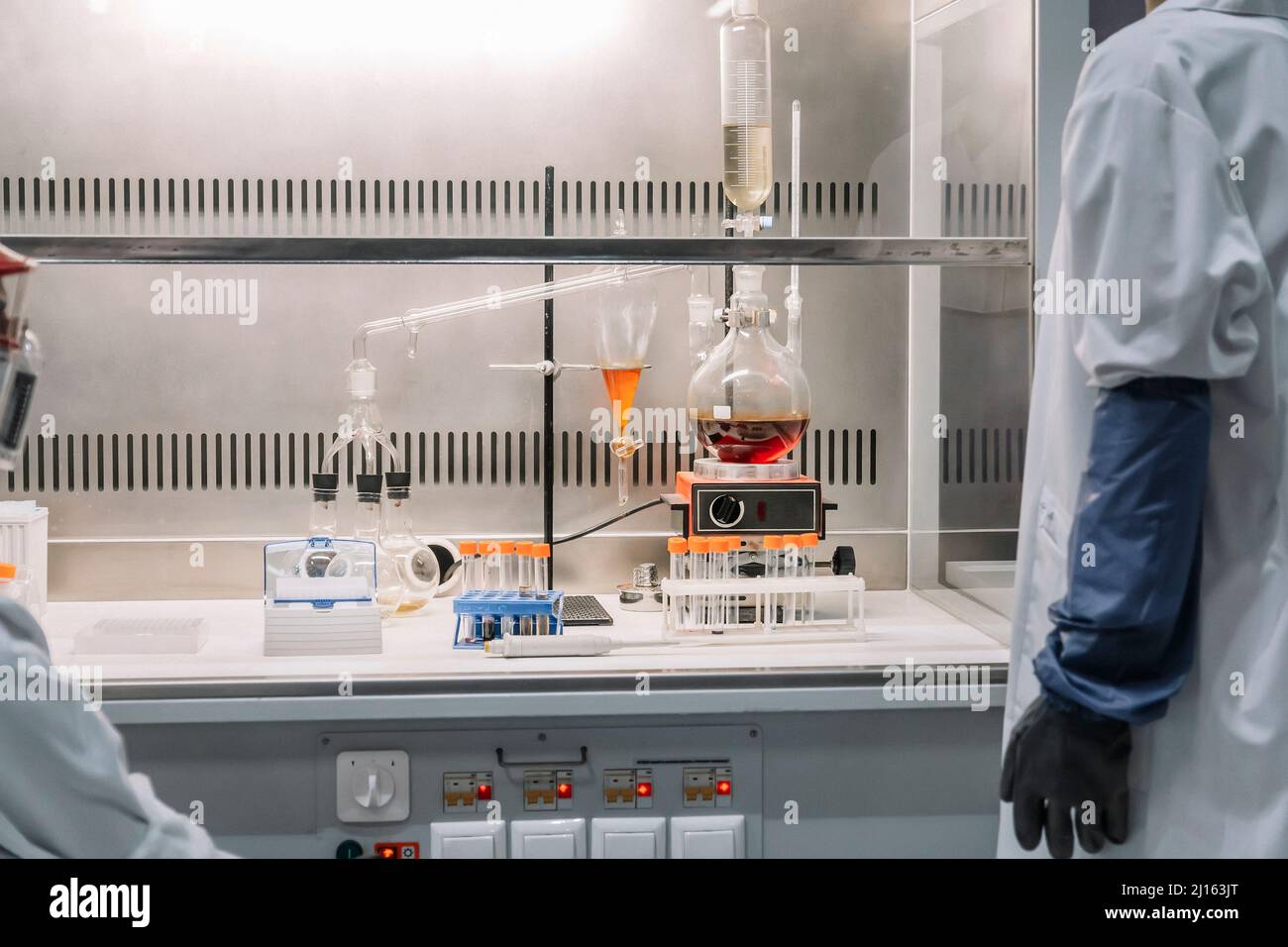 Development chemical weapons. Chemist in chemical protection uniform ...