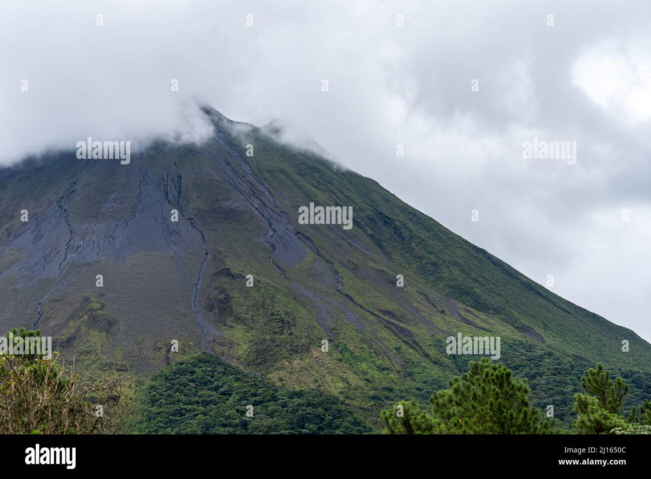 Beautiful cinematic aerial view of the Arenal Volcano in Costa Rica ...