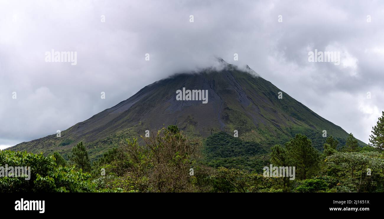 Beautiful cinematic aerial view of the Arenal Volcano in Costa Rica ...