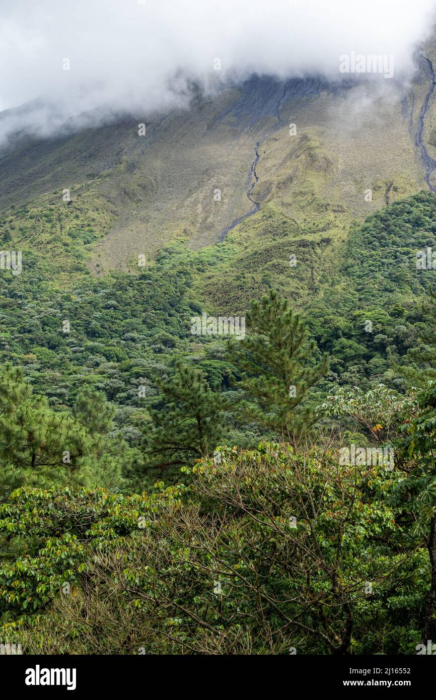 Beautiful cinematic aerial view of the Arenal Volcano in Costa Rica ...