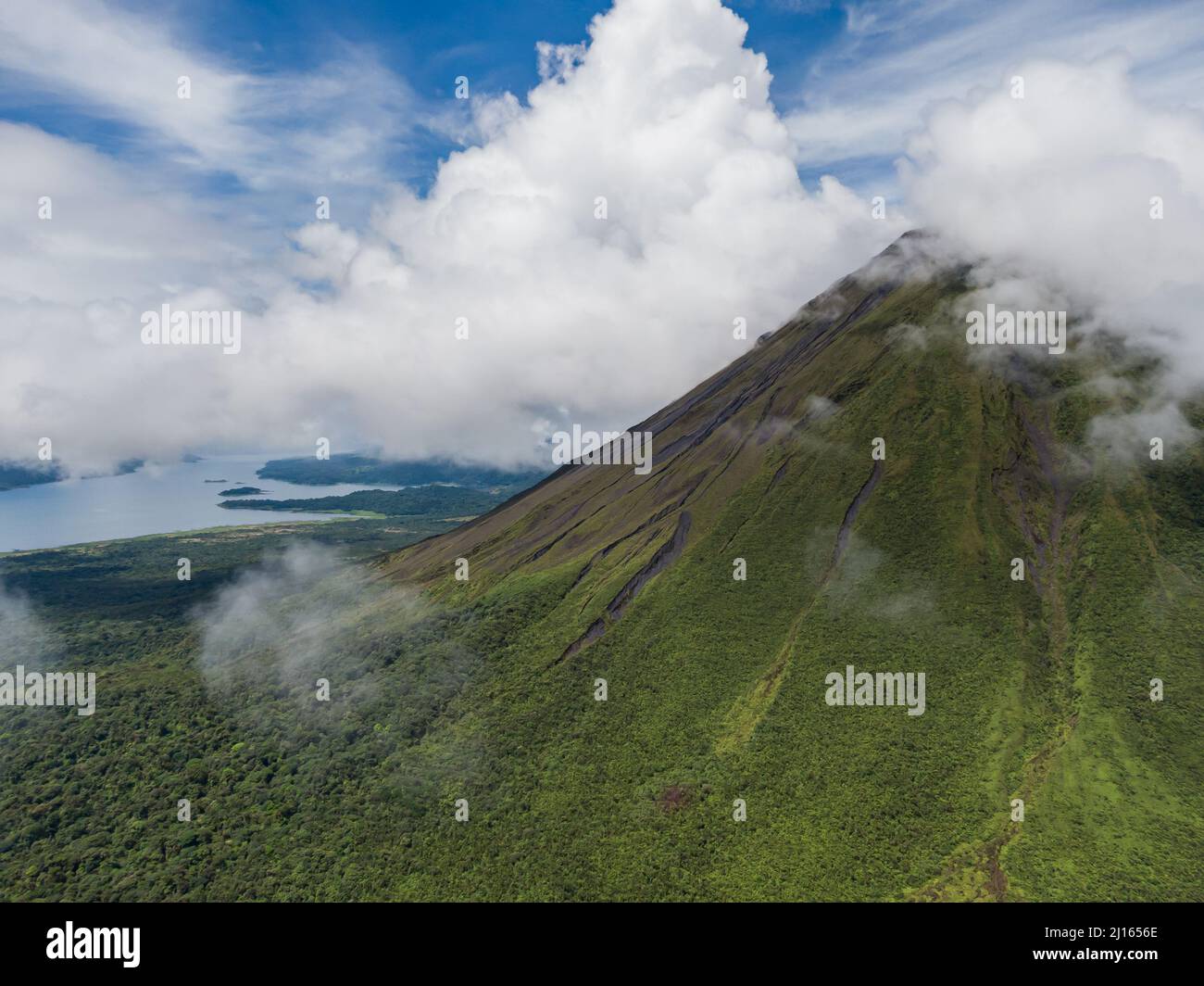 Beautiful cinematic aerial view of the Arenal Volcano in Costa Rica ...