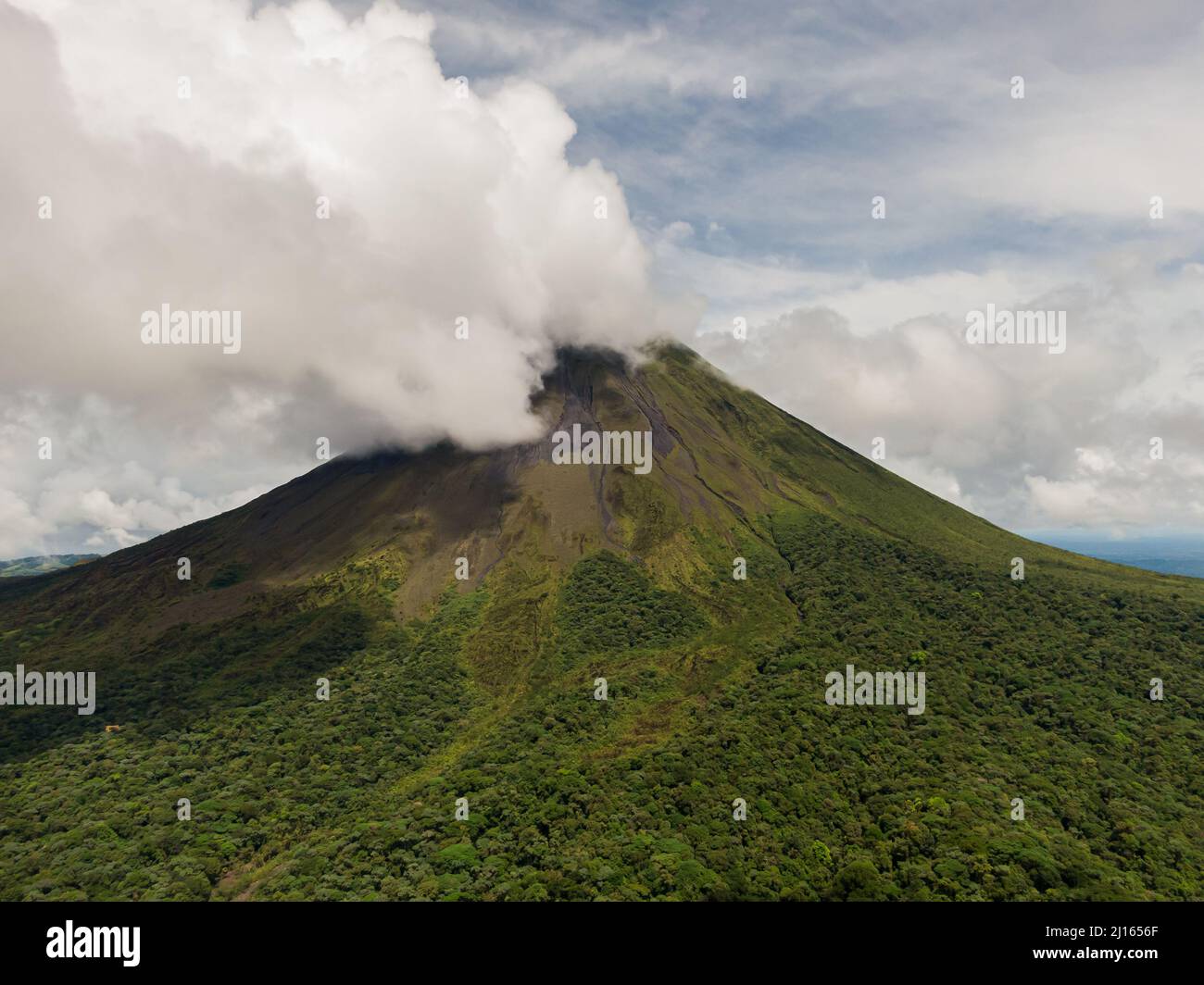 Beautiful cinematic aerial view of the Arenal Volcano in Costa Rica ...
