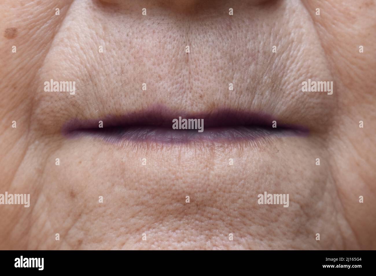 Dark purple lip hi-res stock photography and images - Alamy