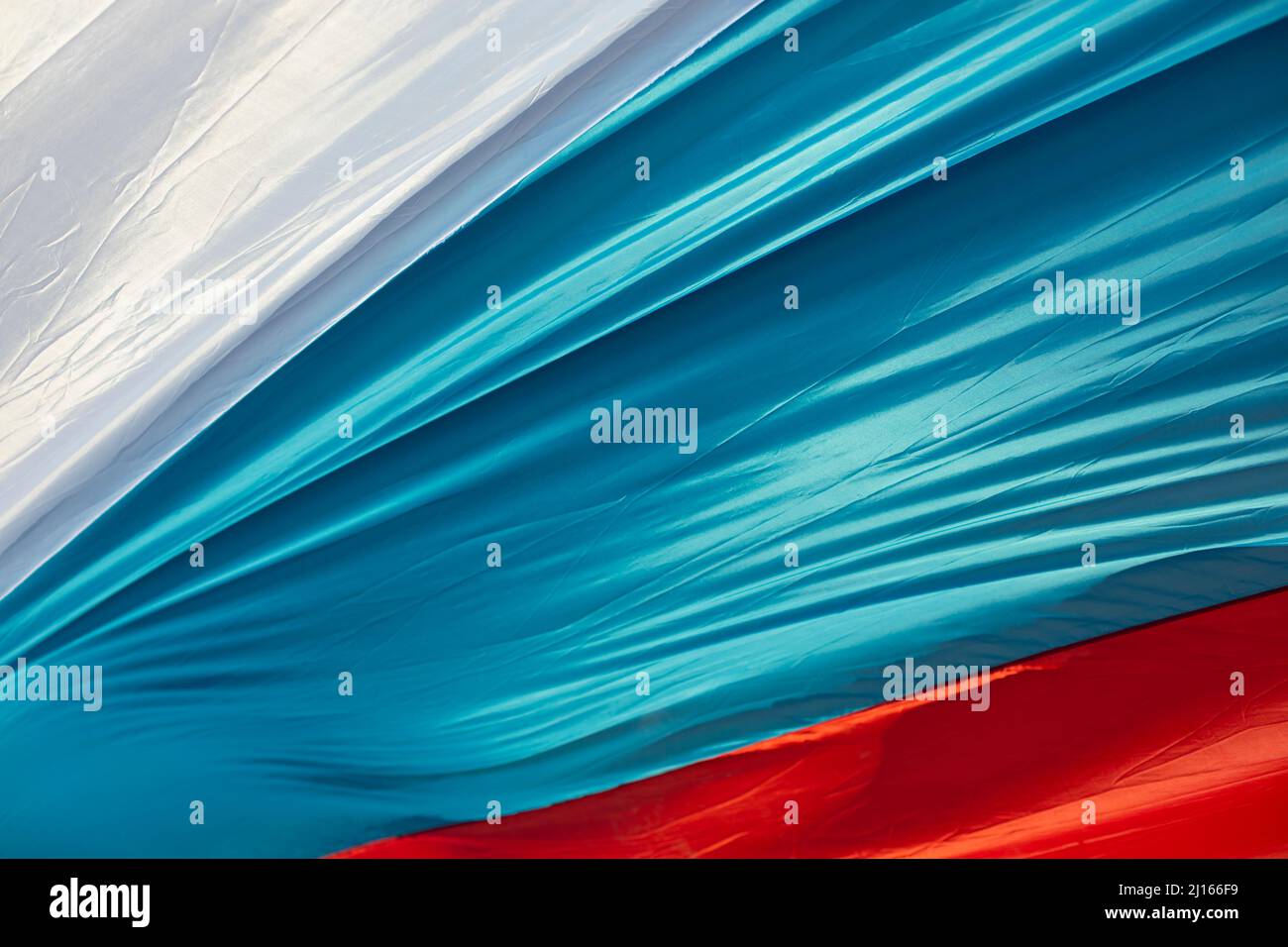 Cloth flag of Russia. Colors of national flag of Russian Federation ...