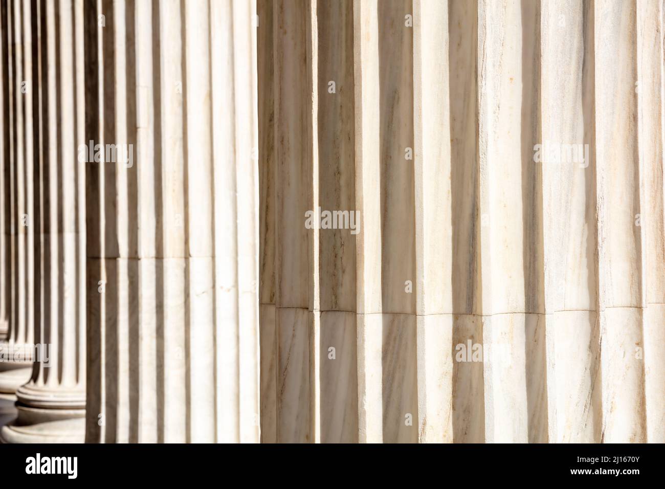 Classic columns white marble, Pillars in a row. Justice building, court ...