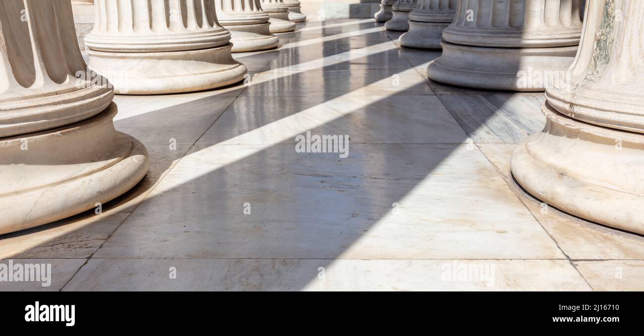 Pillars in a row. Classic columns white marble, Justice building, court ...