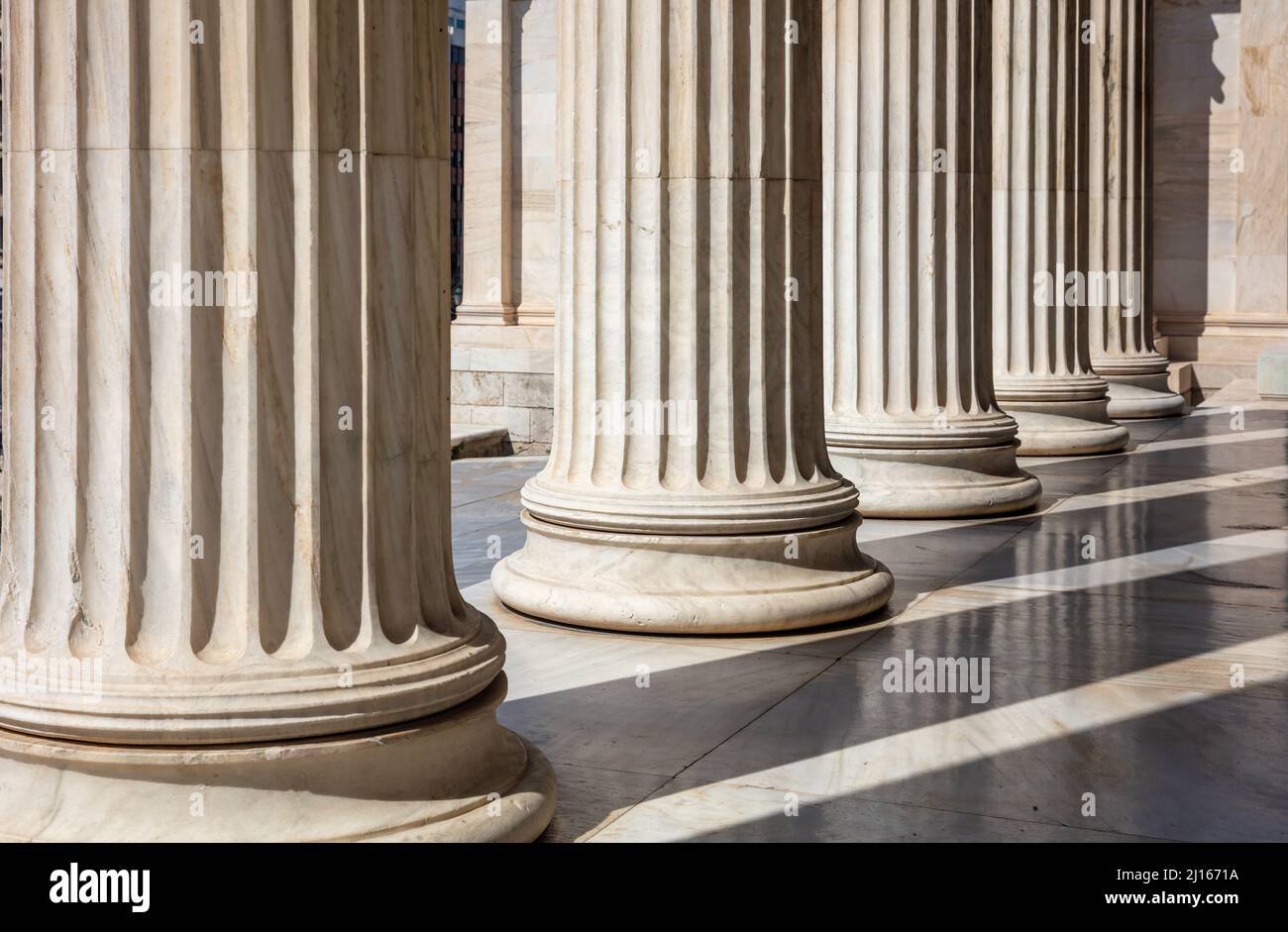Pillars in a row. Classic columns white marble, Justice building, court ...