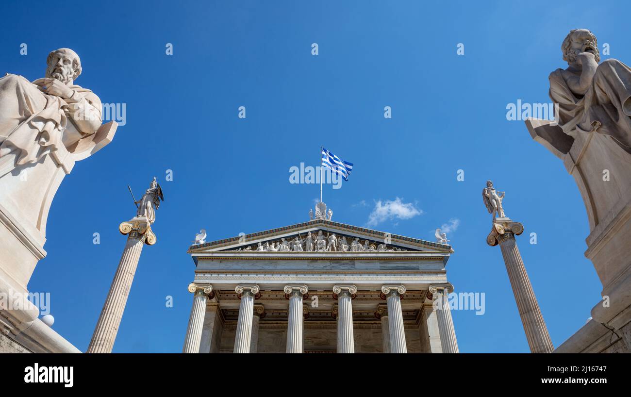 Greece Academy of Athens. main building and statues, low angle view ...