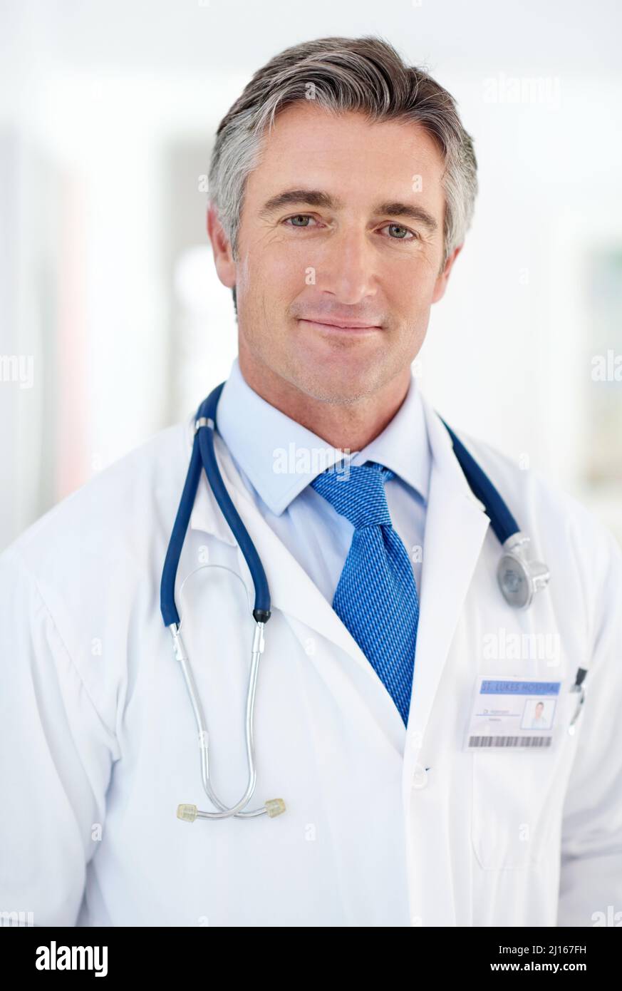 Hes the consummate medical professional. Portrait of a doctor standing ...