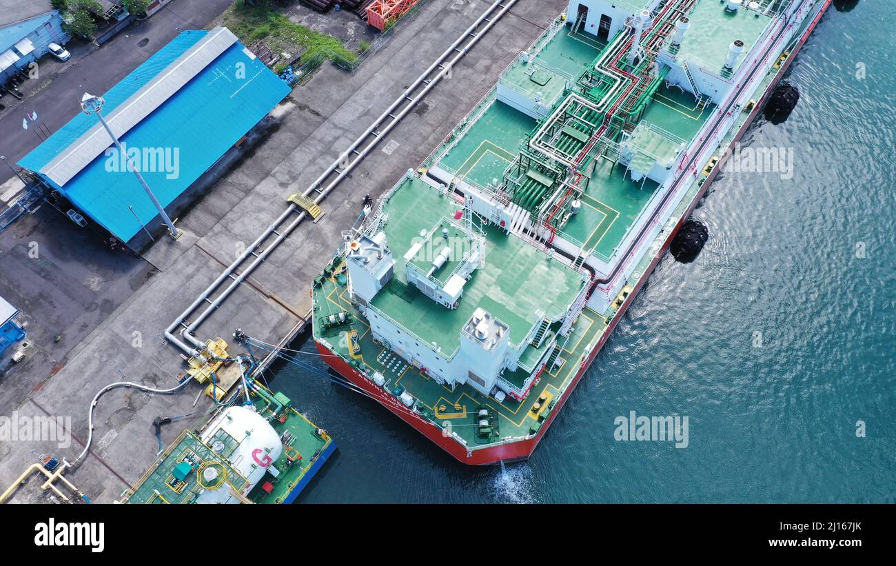 Red and white Floating Storage and Regasification Unit, FSRU, LNG ...