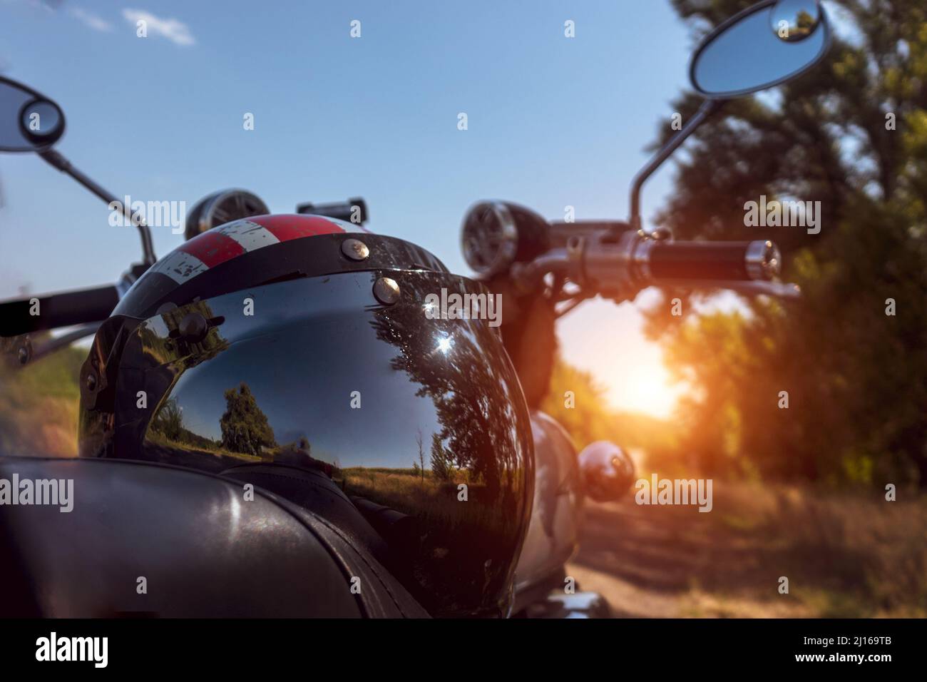Helmet at the helm of a motorcycle. Mirror visor Stock Photo - Alamy