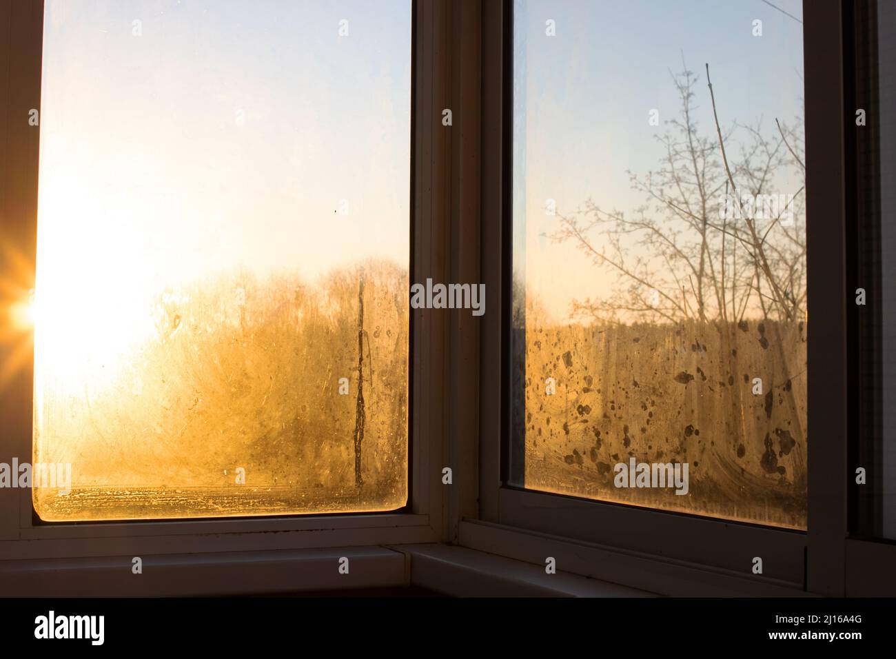 White window frame at dawn in sunlight Stock Photo - Alamy