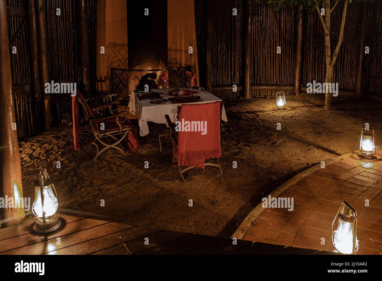Bush dinner table with lanterns, ,South Africa Kwazulu natal, luxury ...