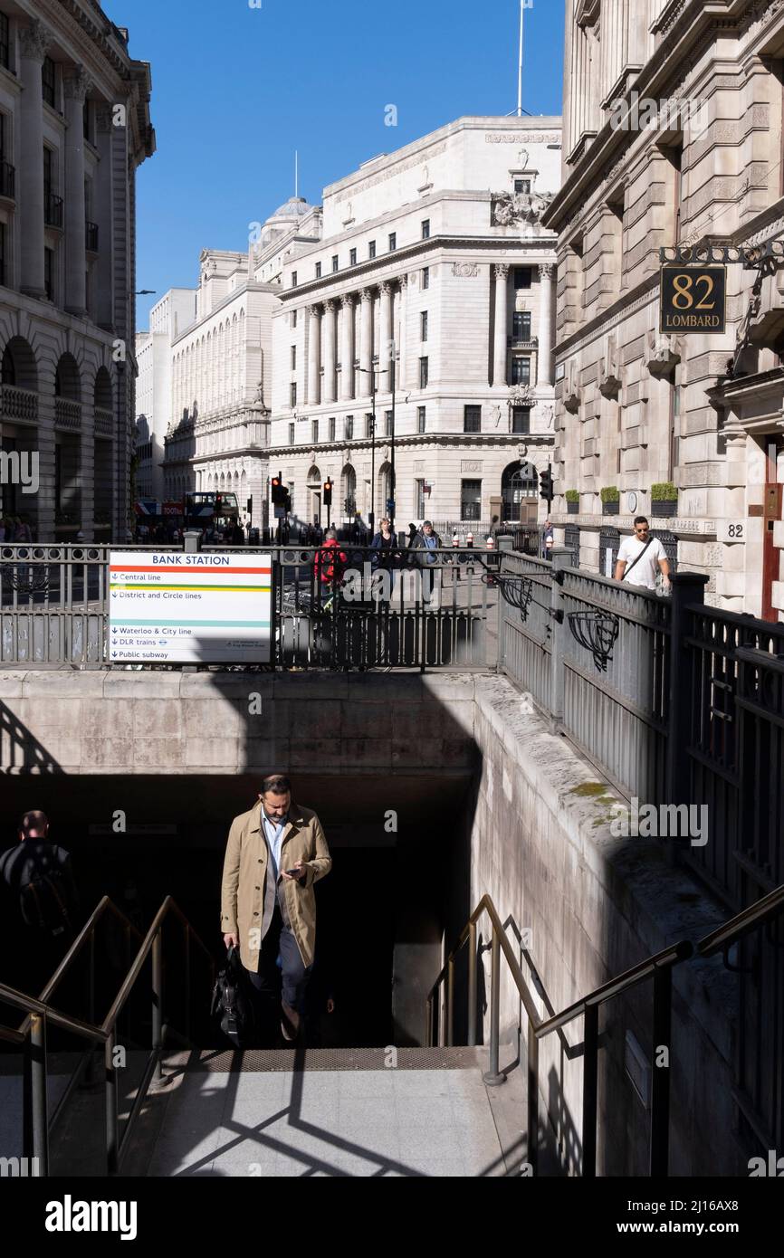 A commuter exits Bank Underground Station at the Lombard Street ...