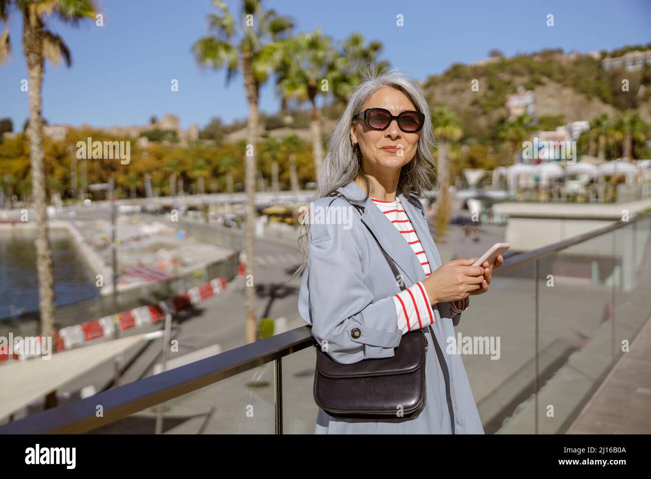 Elegant asian woman walk hi-res stock photography and images - Alamy