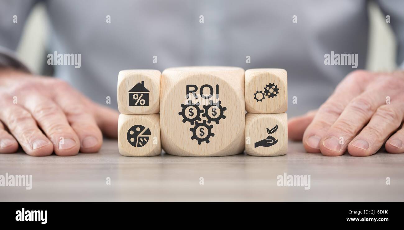 Wooden blocks with symbol of roi concept Stock Photo - Alamy