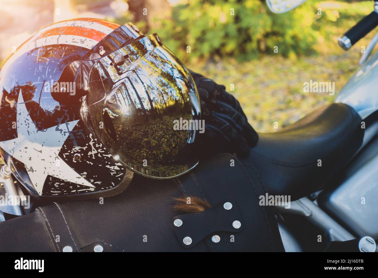 Retro helmet on a motorcycle. Mirror visor Stock Photo - Alamy