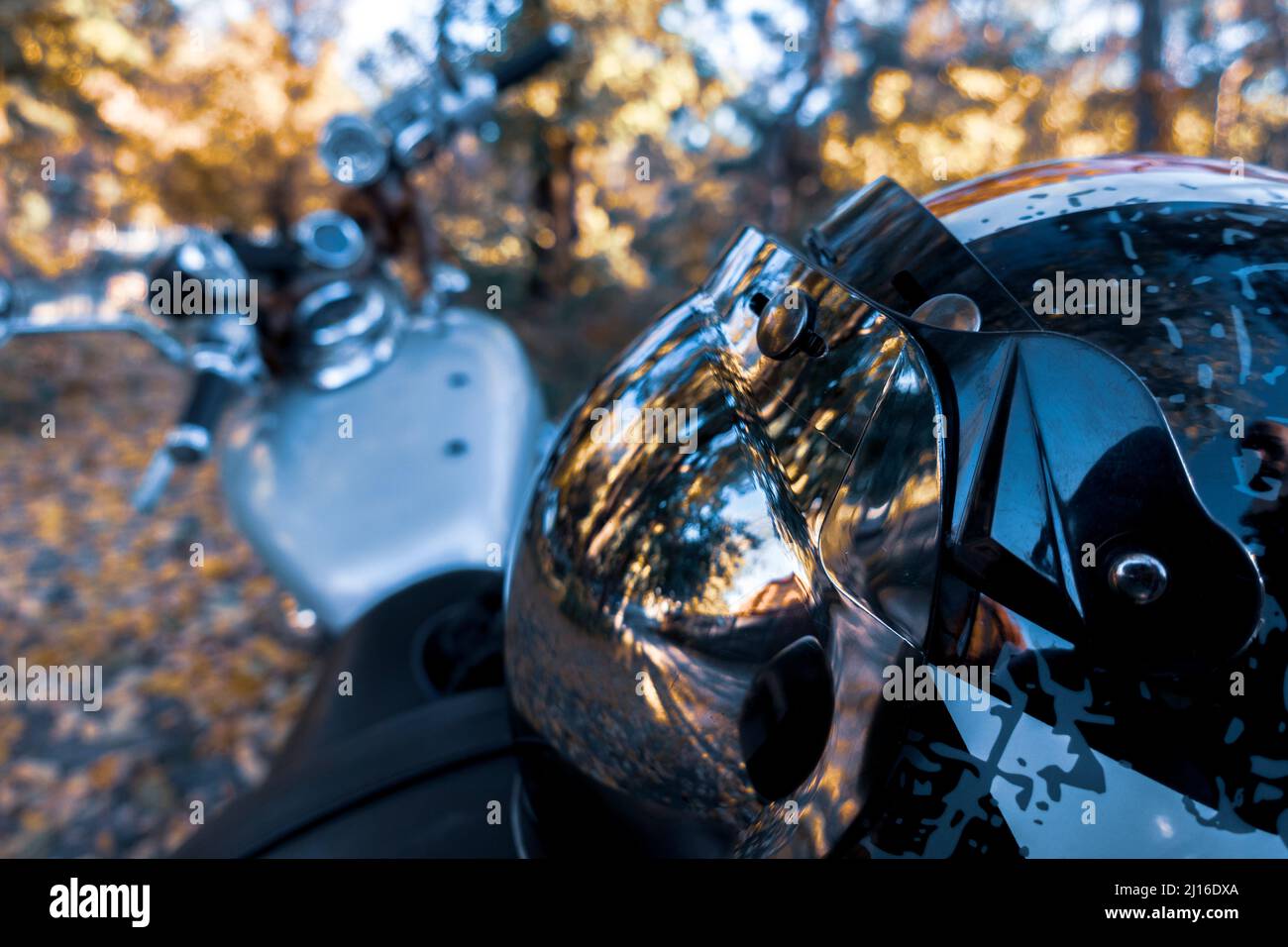 Retro helmet on a motorcycle. Mirror visor Stock Photo - Alamy