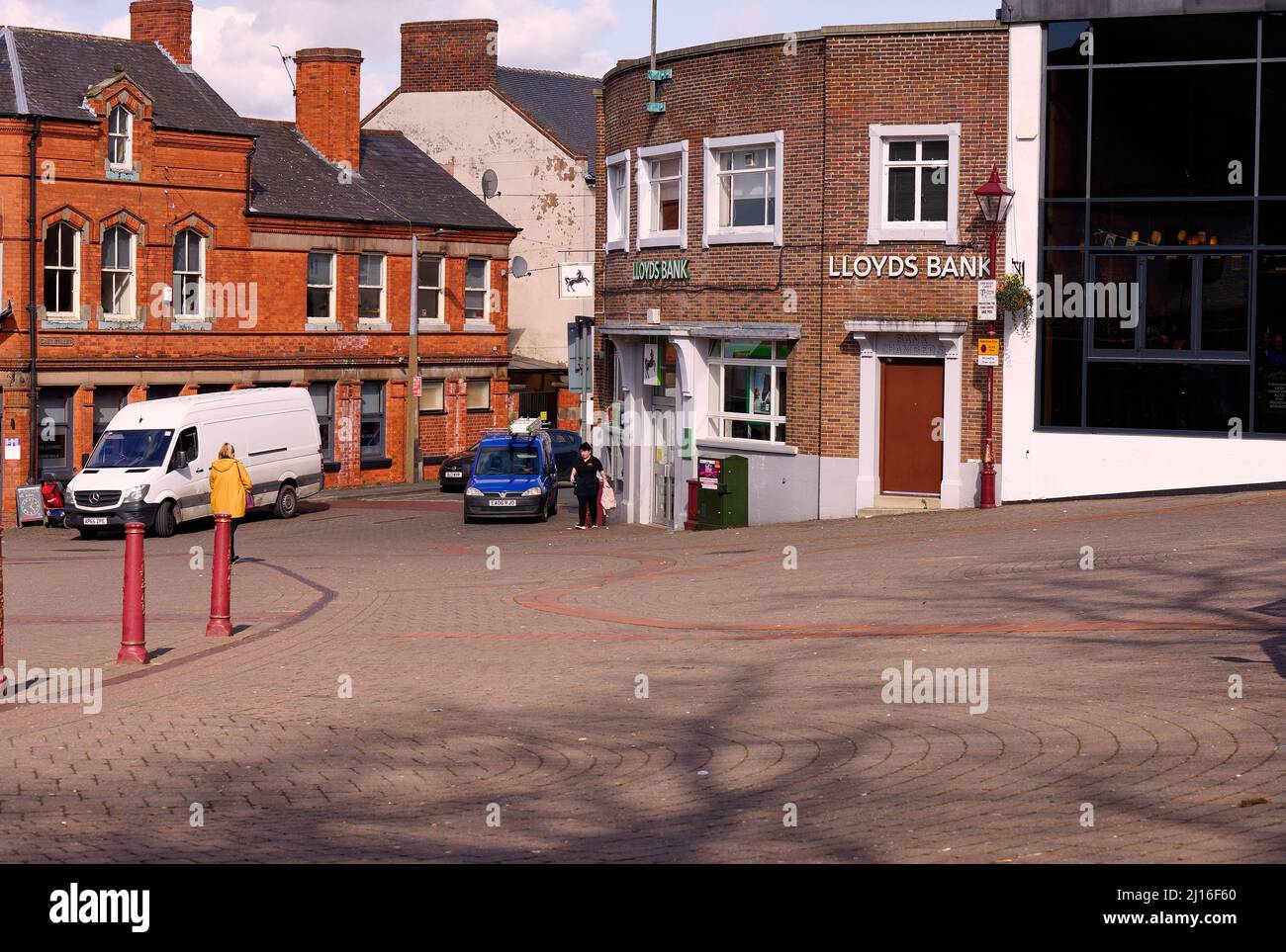 People and shops in a town center in Ilkeston, Derbyshire, UK Stock ...